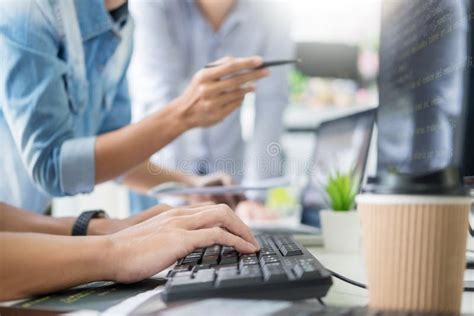 Asian Team Outsource Developer Looking Screen Programming Code Working With Laptop Computer