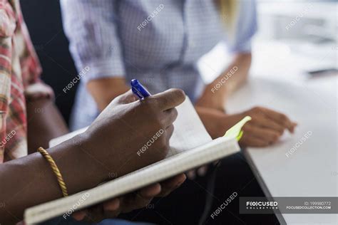 Cropped Image Of Man Writing In Notepad Objects Female Stock Photo 199980772