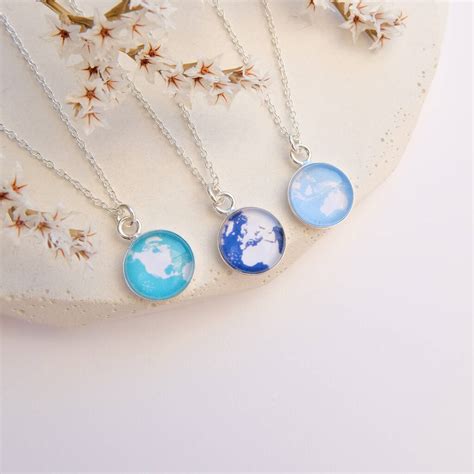 Tiny Sterling Silver Globe Necklace By Cassiopi