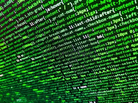 Software Developer Programming Code On Black Screen Screen Of Web Developing Javascript Code