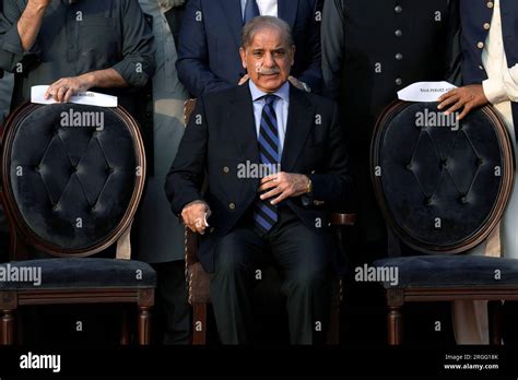 Pakistans Prime Minister Shehbaz Sharif Waits For A Group Photo With