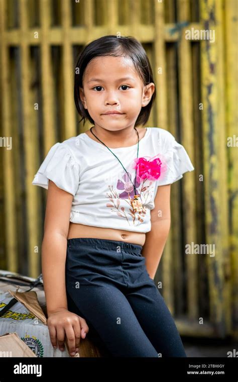 A Pretty Young Filipino Girl Poses For The Camera In Ermita Manila
