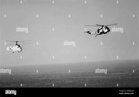 A Soviet Ka Hormone C Helicopter Left Flies Alongside A U S Navy