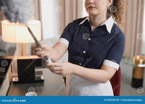 Maid Wearing Uniform Dusting Hotel Room Stock Image Image Of Indoor Female 304703143