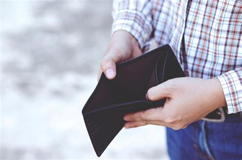 Premium Photo Man Hand Open An Empty Wallet Isolated