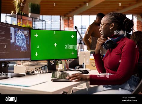 Engineer Using Chroma Key Computer To Do Maintenance On Artificial Intelligence Neural Networks