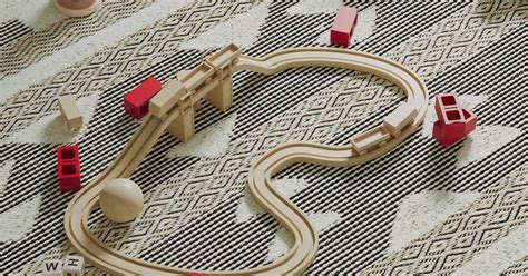 바닥에 장난감이 있는 어린이 놀이 공간 사진 Unsplash의 장난감 기차 이미지