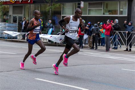 Kenyan Athlete Dickson Chumba And A Pacer Running The Chicago Marathon 2019 Chumba Won The