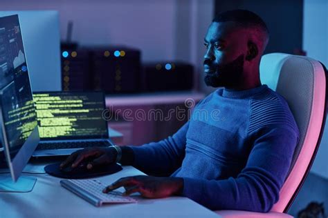 Computer Programmer Working In Neon Light Stock Image Image Of