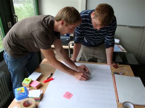 Interacting With Physical Artifacts During Collaborative Ideation Interacting With Physical Artifacts During Collaborative Ideation