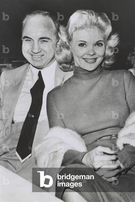 Image Of Gangster Mickey Cohen With Stripper Candy Barr Following Her