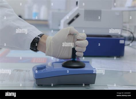 Female Research Scientist Loading Centrifuge Hi Res Stock Photography And Images Alamy