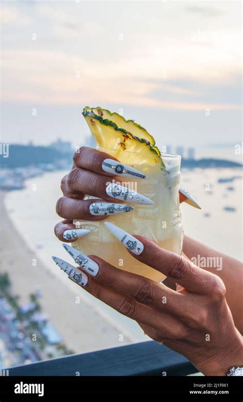 One Pina Colada Cocktail at a Rooftop Bar in Thailand Stock Photo - Alamy