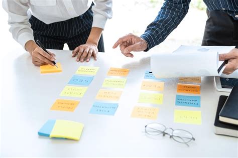 Premium Photo Midsection Of Man With Text On Table