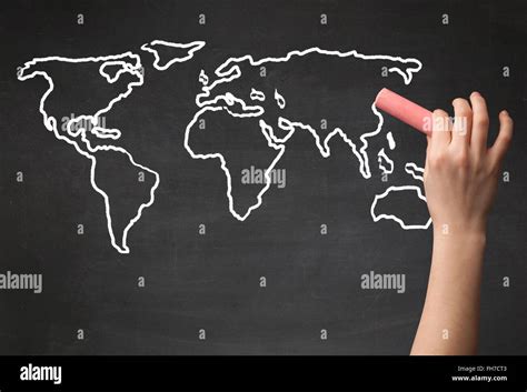Adult Drawing World Map On Chalkboard Stock Photo Alamy