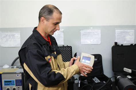 dosimetrist working with isotope analyzer canberra editorial photo image of worker working