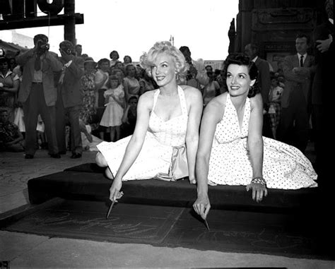 Marilyn Monroe And Jane Russell Putting Their Handprints And Footprints