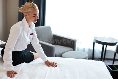 Nice Maid Prepares A Bed For Guests Stock Image Image Of Confident