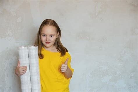 Premium Photo A Man Assembles Furniture At Home According To A