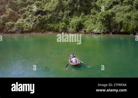Drone Flies Above Girl Rowing Boat With Guy Making Selfie On Wonderful