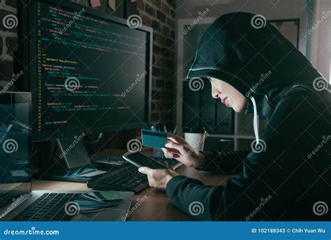 Hacker Holding Credit Card And Mobile Smartphone Stock Image Image Of Network Dark