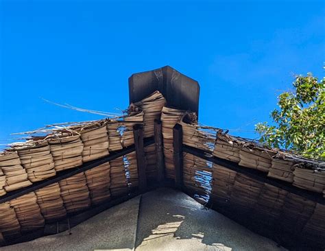 Premium Photo Nipa Palm Dried Leaves And Bamboo Made The Roof On A Blue Sky Background