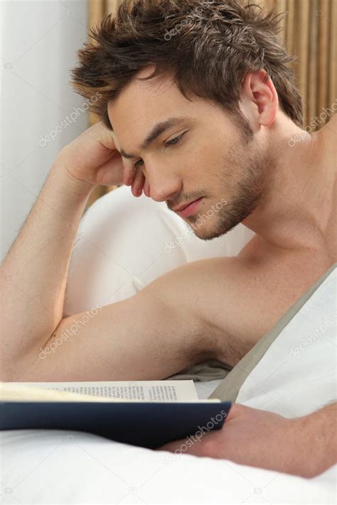 Man Reading In Bed Stock Photo By Photography33 9580229