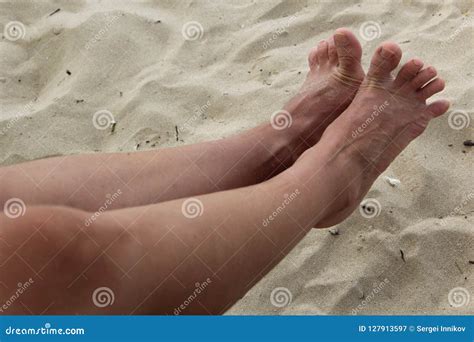 The Girl Spread Her Toes In The Frame Two Legs Royalty Free Stock