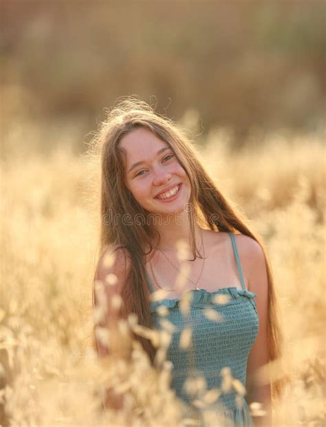 Blond Slavic Ukrainian Girl In A Wheat Field At Sunset Fresh Air