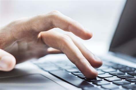 Premium Photo Businessman Typing On Laptop Keyboard In Sunny Office Business And Technology