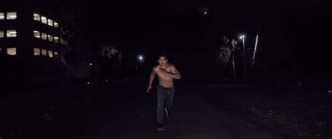 Muscular Man Running In The Dark Stock Footage VideoHive