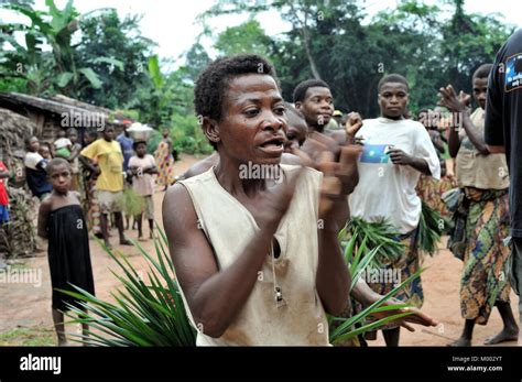People From A Tribe Of Baka Pygmies In Village Of Ethnic Singing