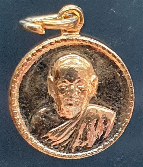 Thai Amulet เหรียญกลมเล็ก ปี 2519 กะไหล่ทอง หลวงพ่อแพ Facebook