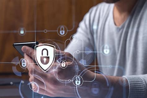 Premium Photo A Programmer Is Browsing The Internet In Smart Phone To Protect A Cyber Security