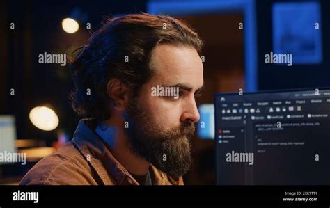 Focused Software Developer In Home Office Doing Coding On Computer At Desk Close Up It