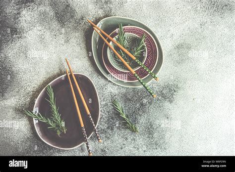 Asian Style Table Setting With Chopsticks On Grey Background With Copy