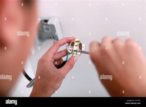 Electrician Wiring A Socket Stock Photo Alamy