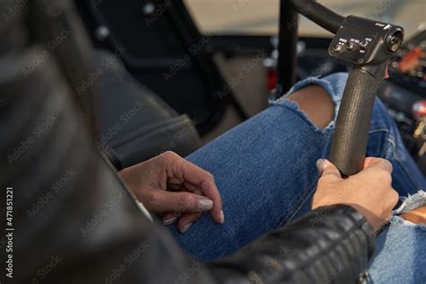 Female Air Pilot Touching The Control Mechanism In Cockpit Stock Photo Adobe Stock