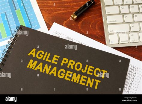 Book With Title Agile Project Management In An Office Stock Photo Alamy