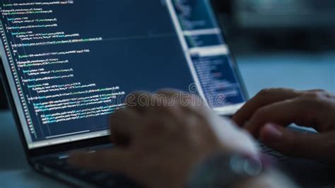 Close Up Focus On Person S Hands Typing On The Desktop Computer Keyboard Screens Show Coding