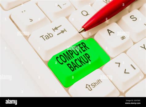 Sign Displaying Computer Backup Conceptual Photo The Act Of Copying Of Files And Data Onto A