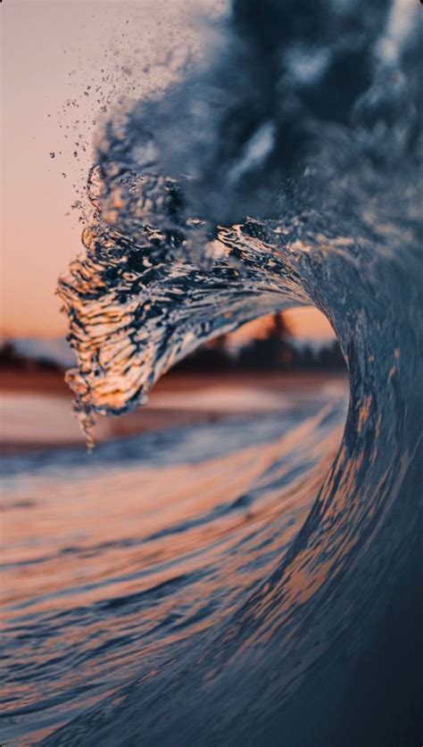 Captivating Ocean Wave At Sunset
