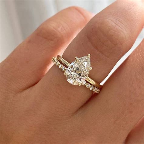Lovely Yellow Gold Pear Cut Wedding Ring Set In Sterling Silver