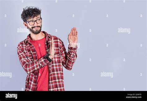 Disgusted Intense Man With Rejection Gesture Pulls Palms In Rejection