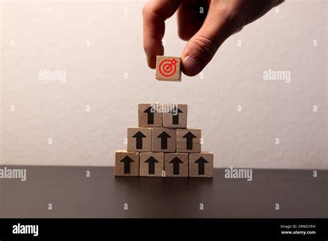 Hand Putting Print Screen Dart And Target Board Wooden Cube On Up Arrows Target Of Investment