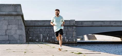 Premium Photo A Strong Hardy Athlete Training Outdoors An Active And