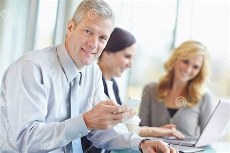 I Couldnt Do Business Without It Smartphone Technology A Handsome Mature Businessman Using