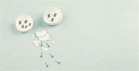 Premium Photo Cracked Eggshell With Tally Marks Lines Or Sticks And Footprints Of A Chick