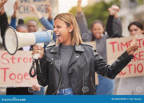 Protest Demonstration And Woman With Megaphone In City Shouting For