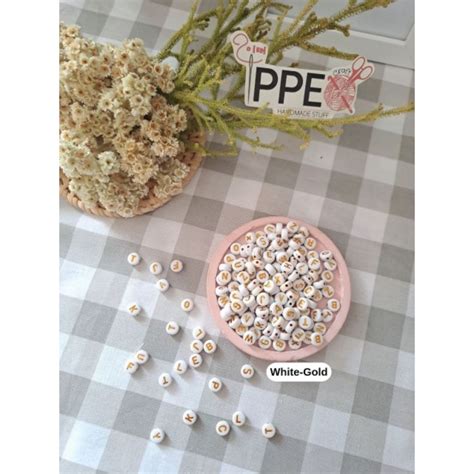 Jual Mote Manik Huruf Bulat Pipih 25gr Shopee Indonesia